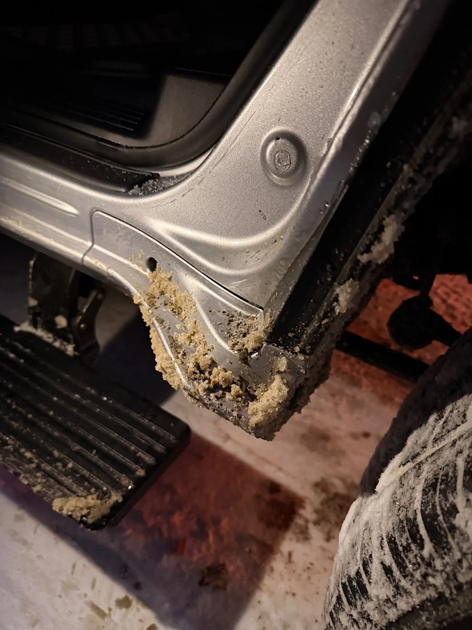 Gap below rear door letting snow/mud inside — normal design or missing ...